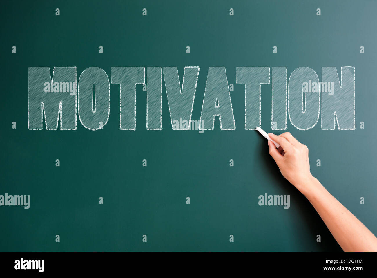 motivation written on blackboard Stock Photo - Alamy