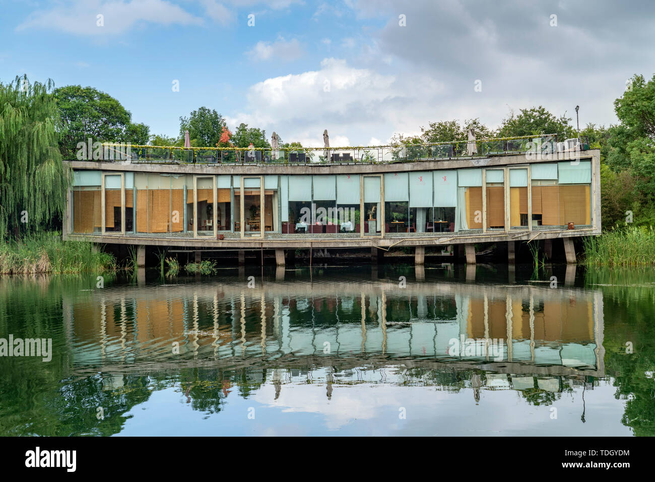 Five scattered house building Stock Photo - Alamy