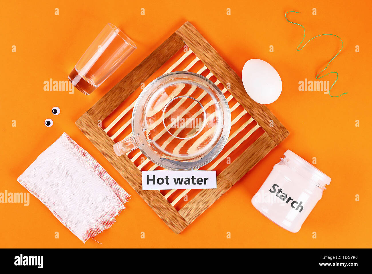 1 Diy Halloween ghost of starch and gauze on orange background. Gift ...