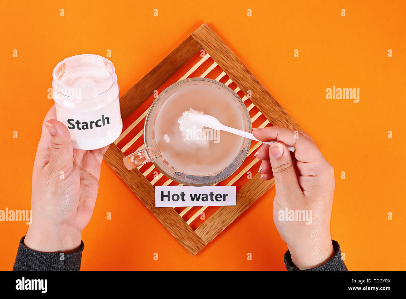 2 Diy Halloween ghost of starch and gauze on orange background. Gift ...