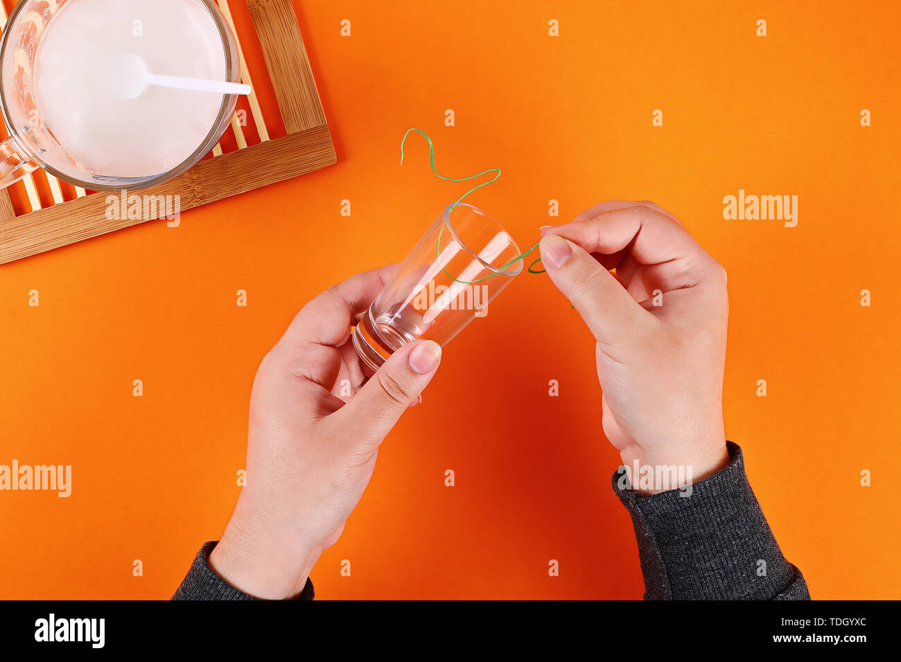 4 Diy Halloween ghost of starch and gauze on orange background. Gift ...
