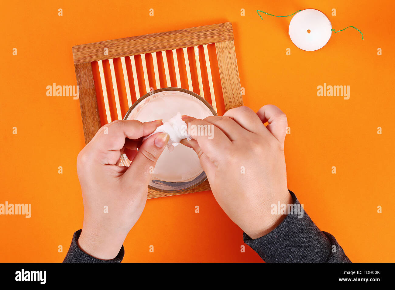 6 Diy Halloween ghost of starch and gauze on orange background. Gift ...