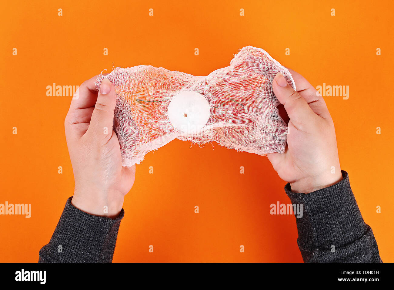 7 Diy Halloween ghost of starch and gauze on orange background. Gift ...