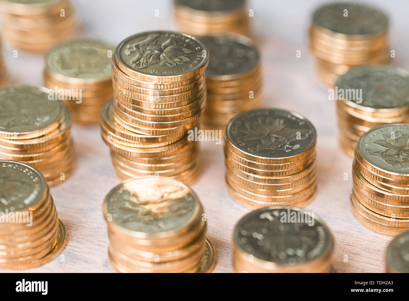 Stacked gold coins Stock Photo - Alamy