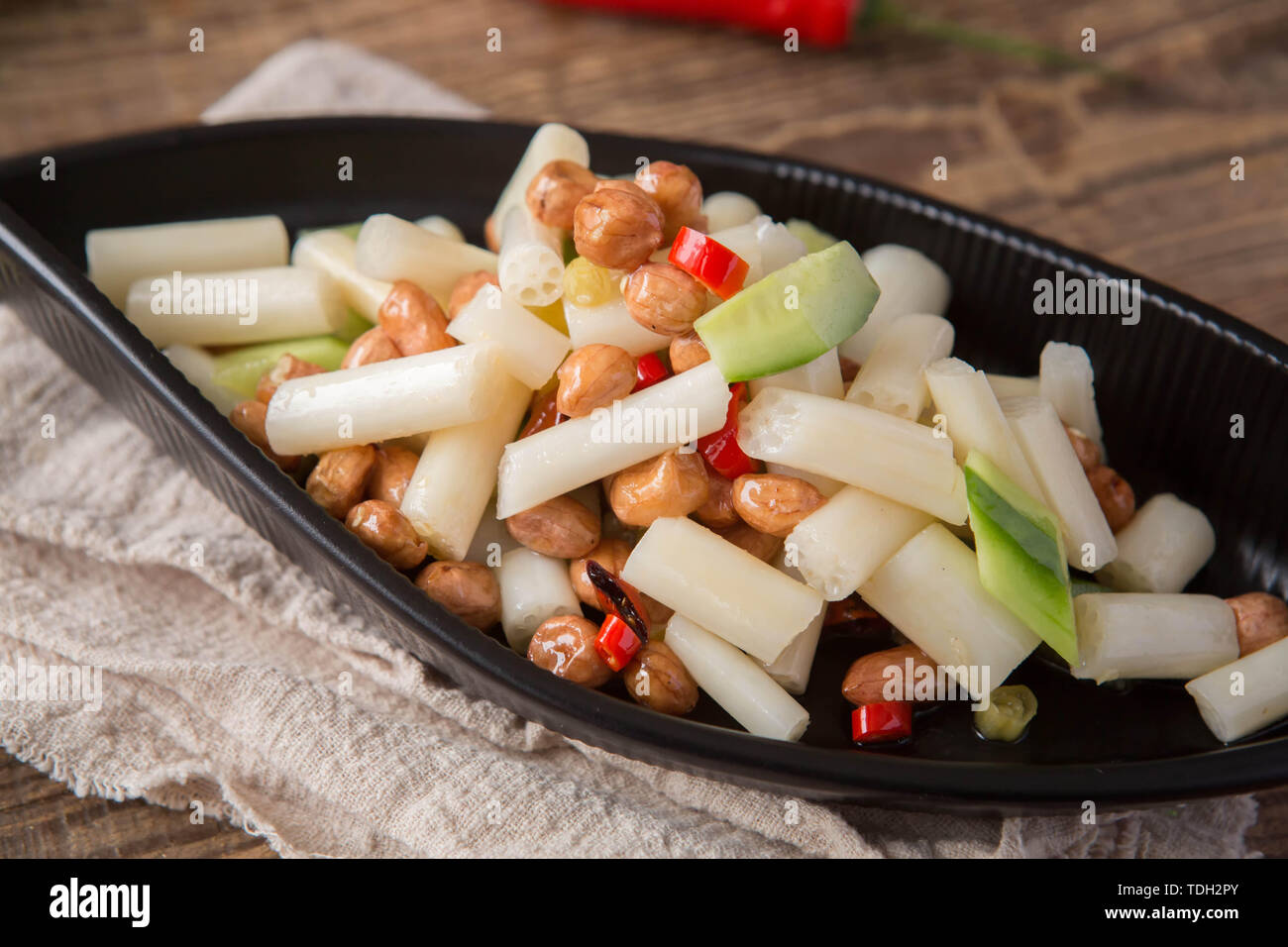 Lotus root pointed cucumber mixed with peanuts Stock Photo - Alamy