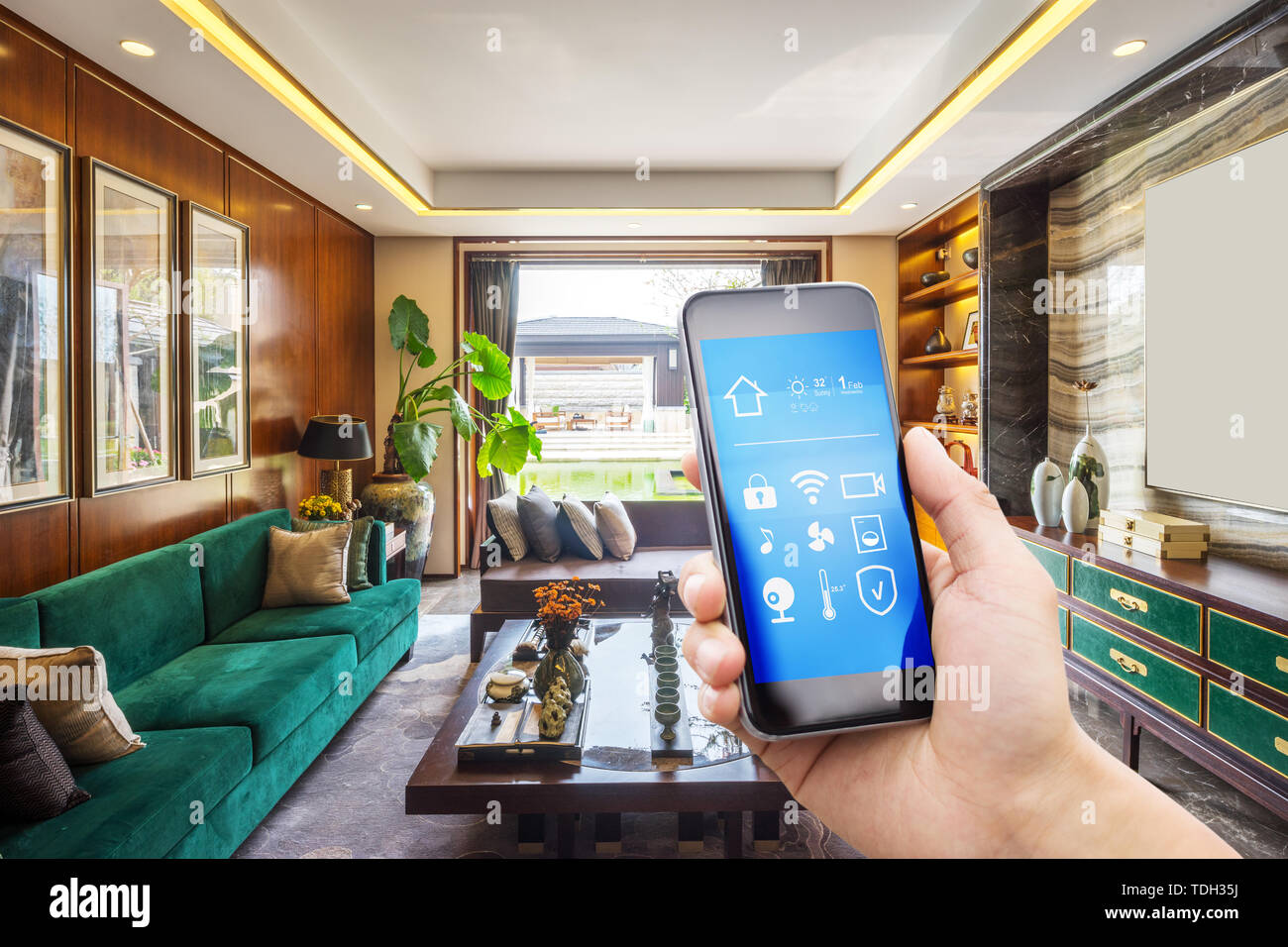 smart phone with smart home with modern living room Stock Photo - Alamy