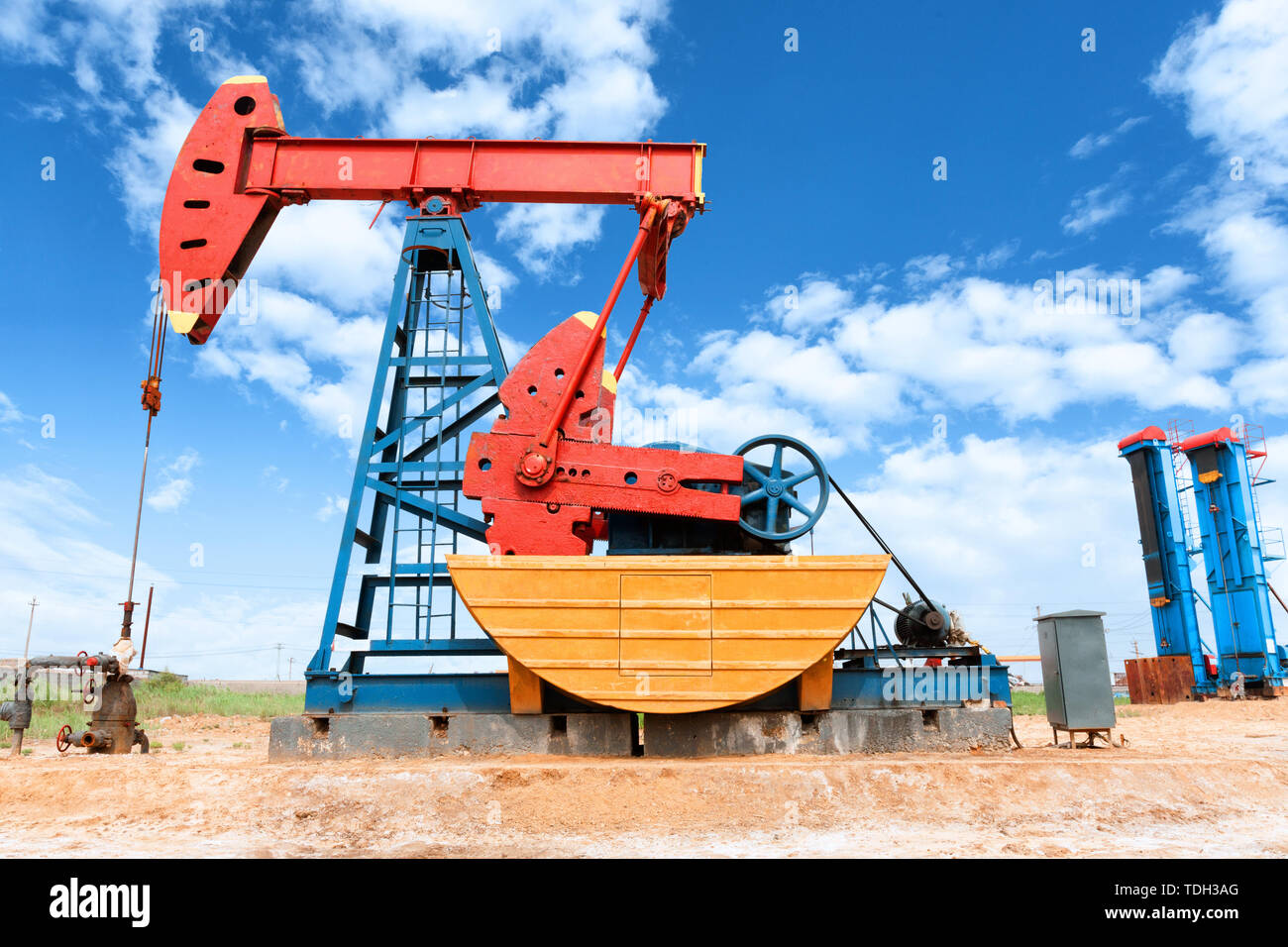Oil well and bluesky Stock Photo - Alamy