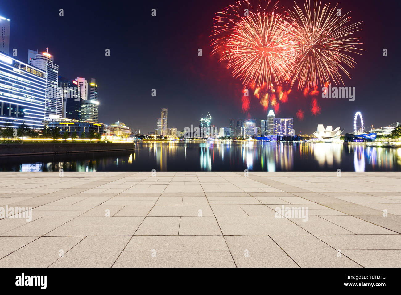 firework and night view of prosperous city Stock Photo - Alamy
