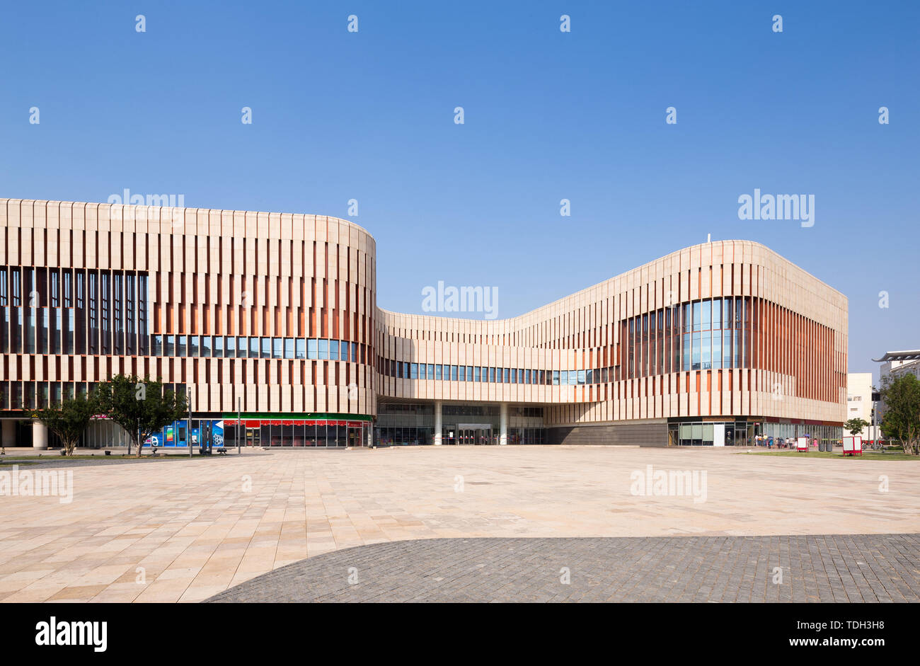 Modern building with empty road floor Stock Photo - Alamy
