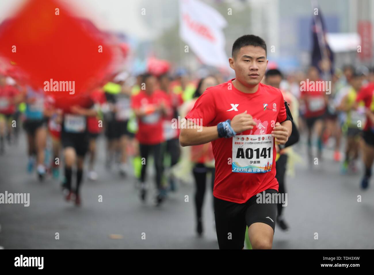 Long distance action marathon running hi-res stock photography and ...