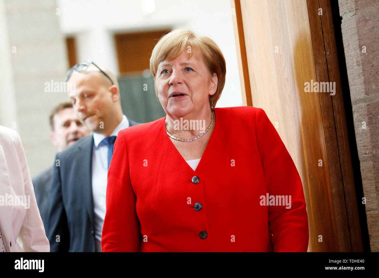 Angela Merkel enters the Golden Book of the city of Koln in the ...