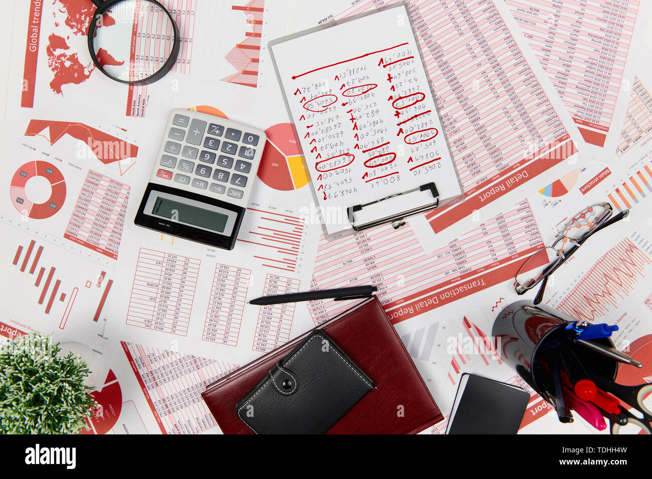 Flat top view of business work space with reports. Business financial ...