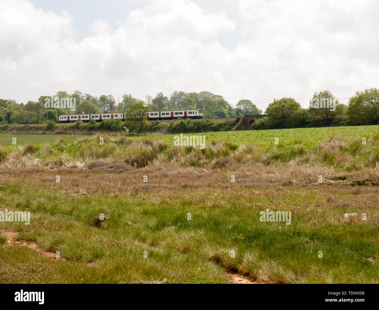 train riding through countryside scene on tracks travel background ...
