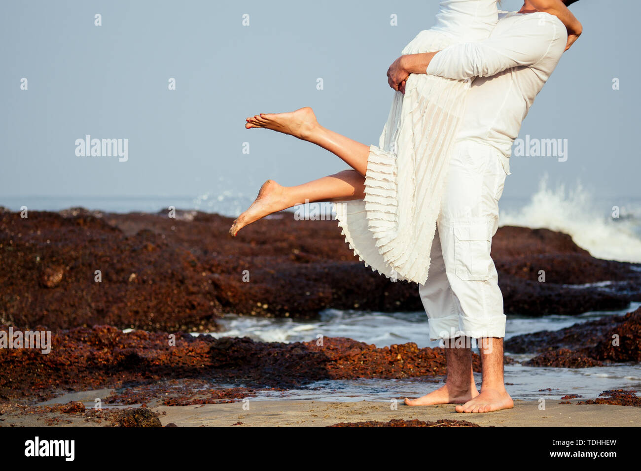 Legs couple standing on beach hi-res stock photography and images - Alamy