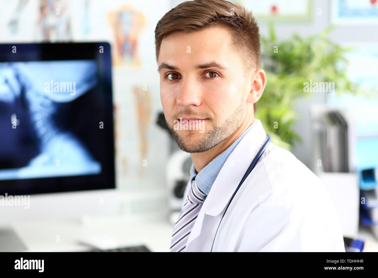 Young doctor looking ray picture hi-res stock photography and images ...
