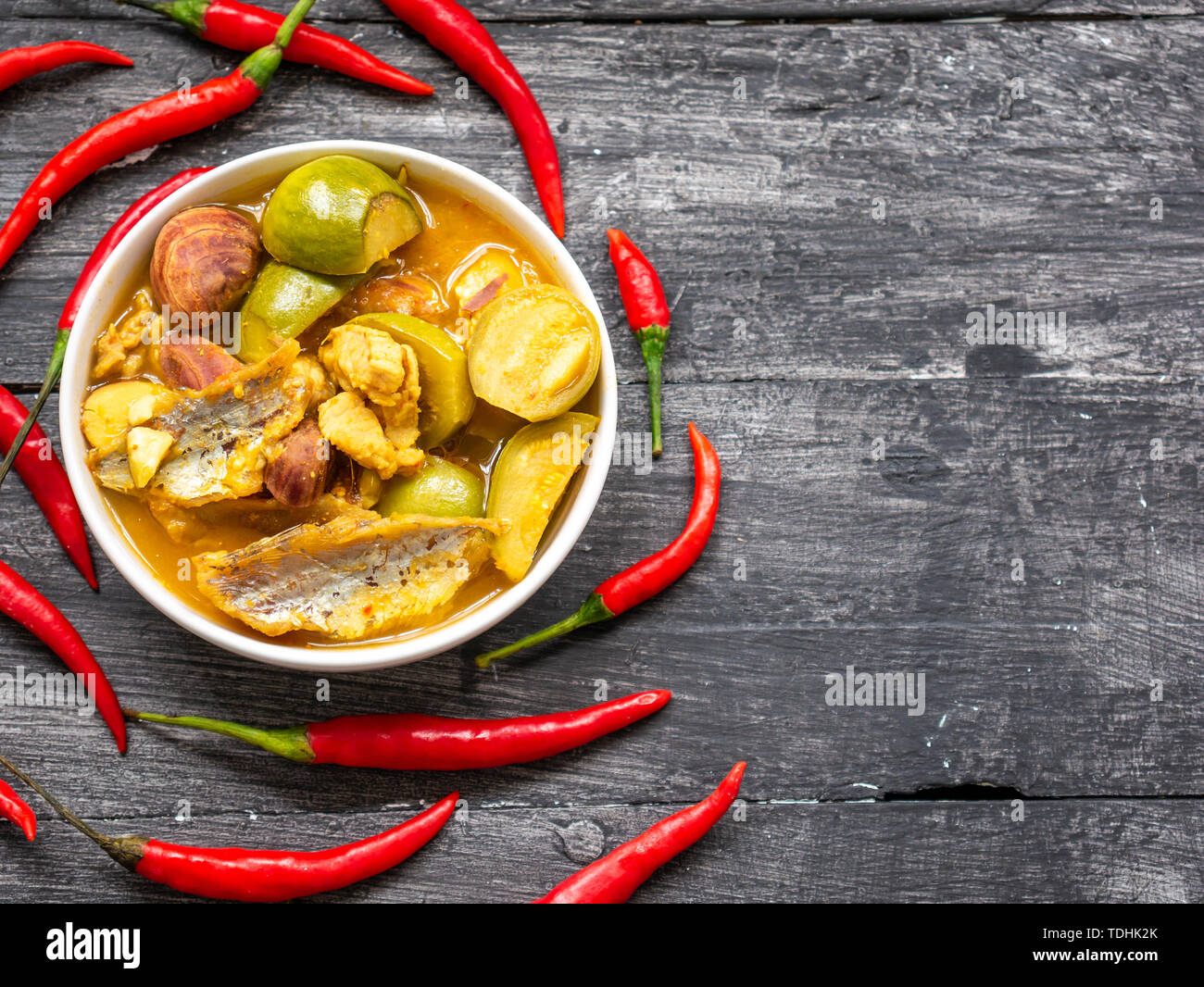 Southern Thai Spicy Sour Yellow Curry with dried fish and Thai eggplant ...