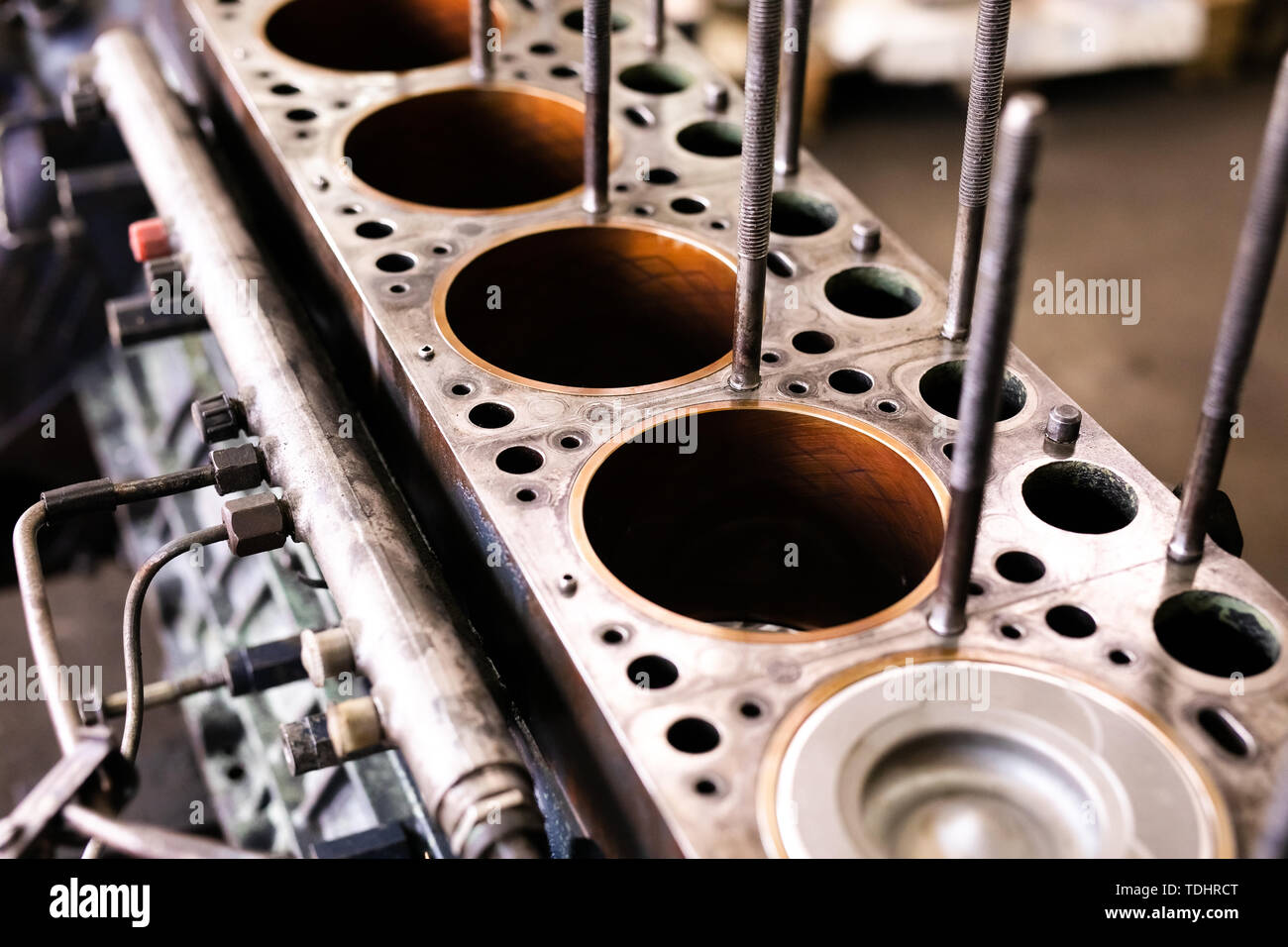 Mechanic opened the locking valve mechanism. Disassemble engine block ...