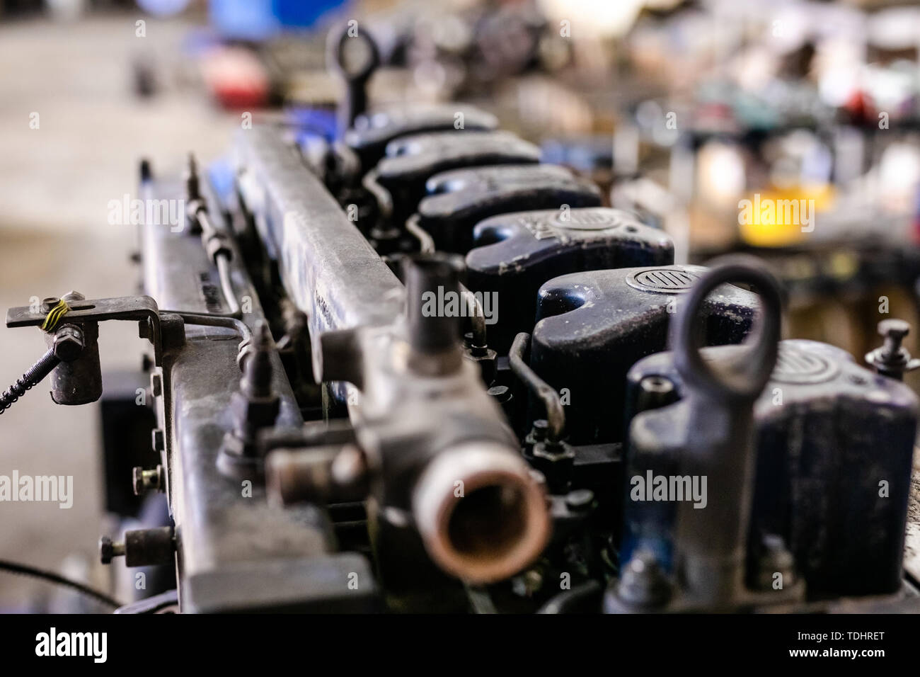 Mechanic opened the locking valve mechanism. Disassemble engine block ...