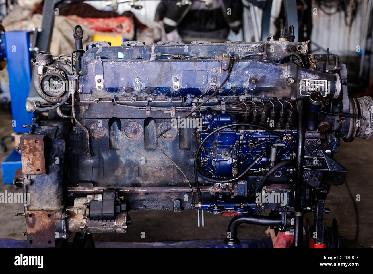 Mechanic opened the locking valve mechanism. Disassemble engine block ...