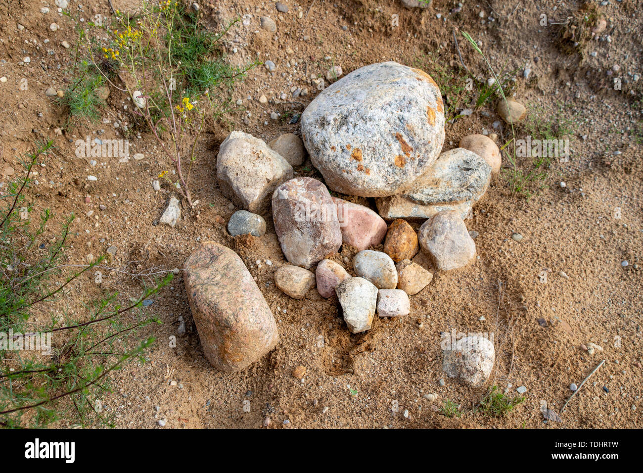 Stones lying in a meadow. Field stones left behind. Season of the ...