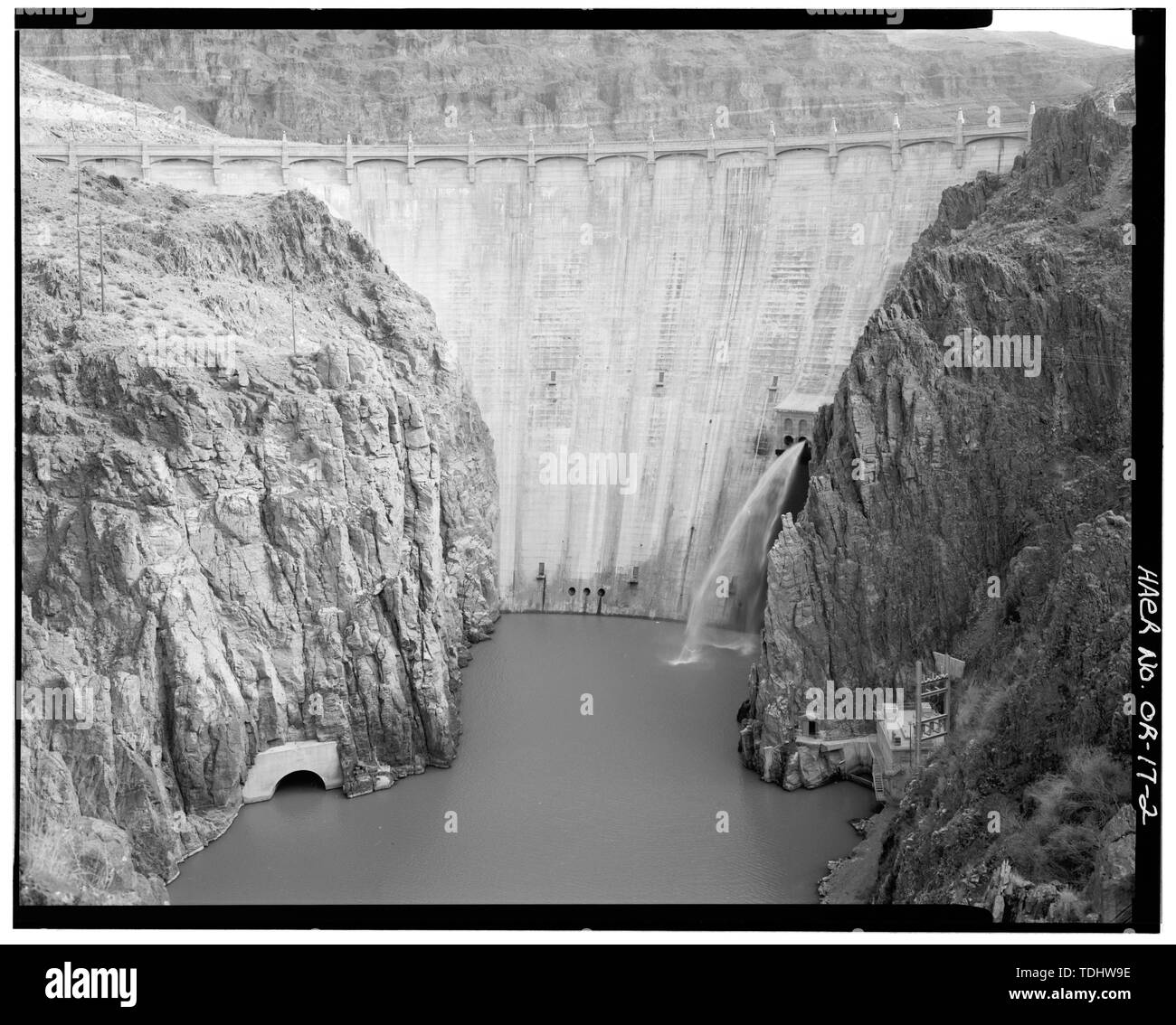 OVERALL VIEW UPSTREAM OF DAM, SHOWING VALVEHOUSE, OUTLET TUNNEL PORTAL ...