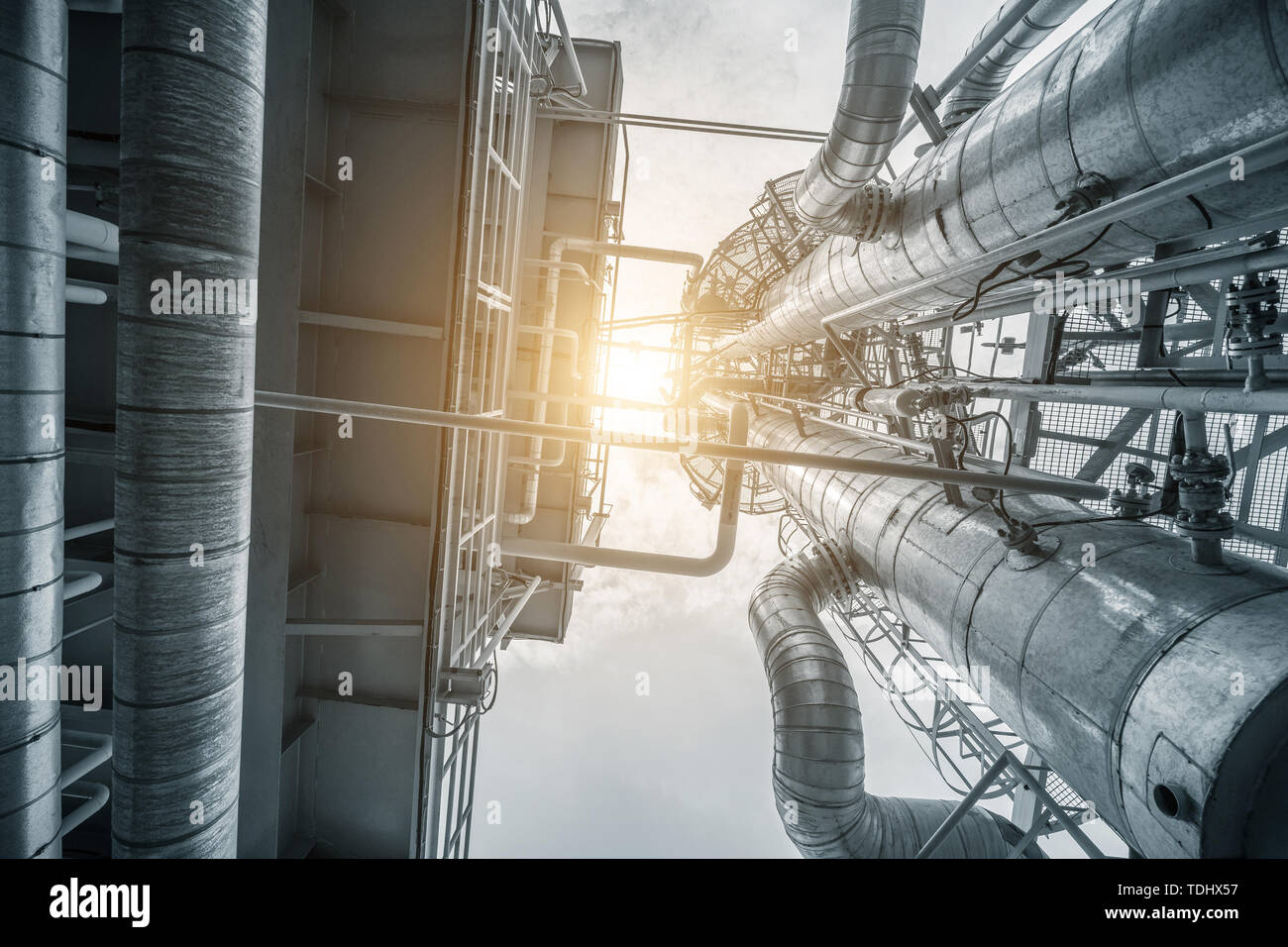 Oil-rig of oilfield day and night Stock Photo - Alamy