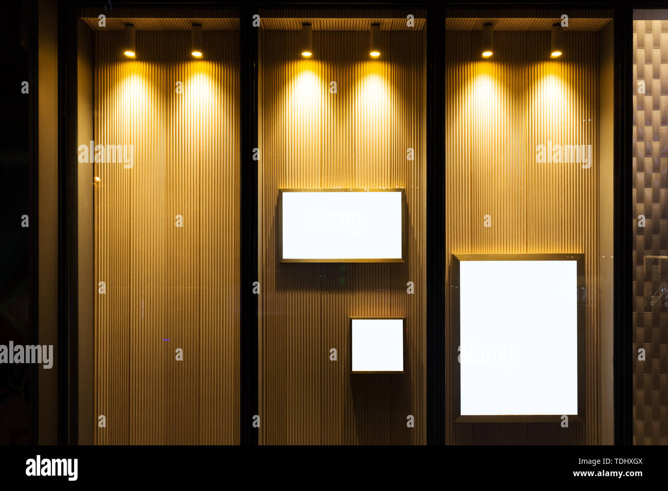 backgrounds wall with lights and pictures in modern shopping mall Stock ...