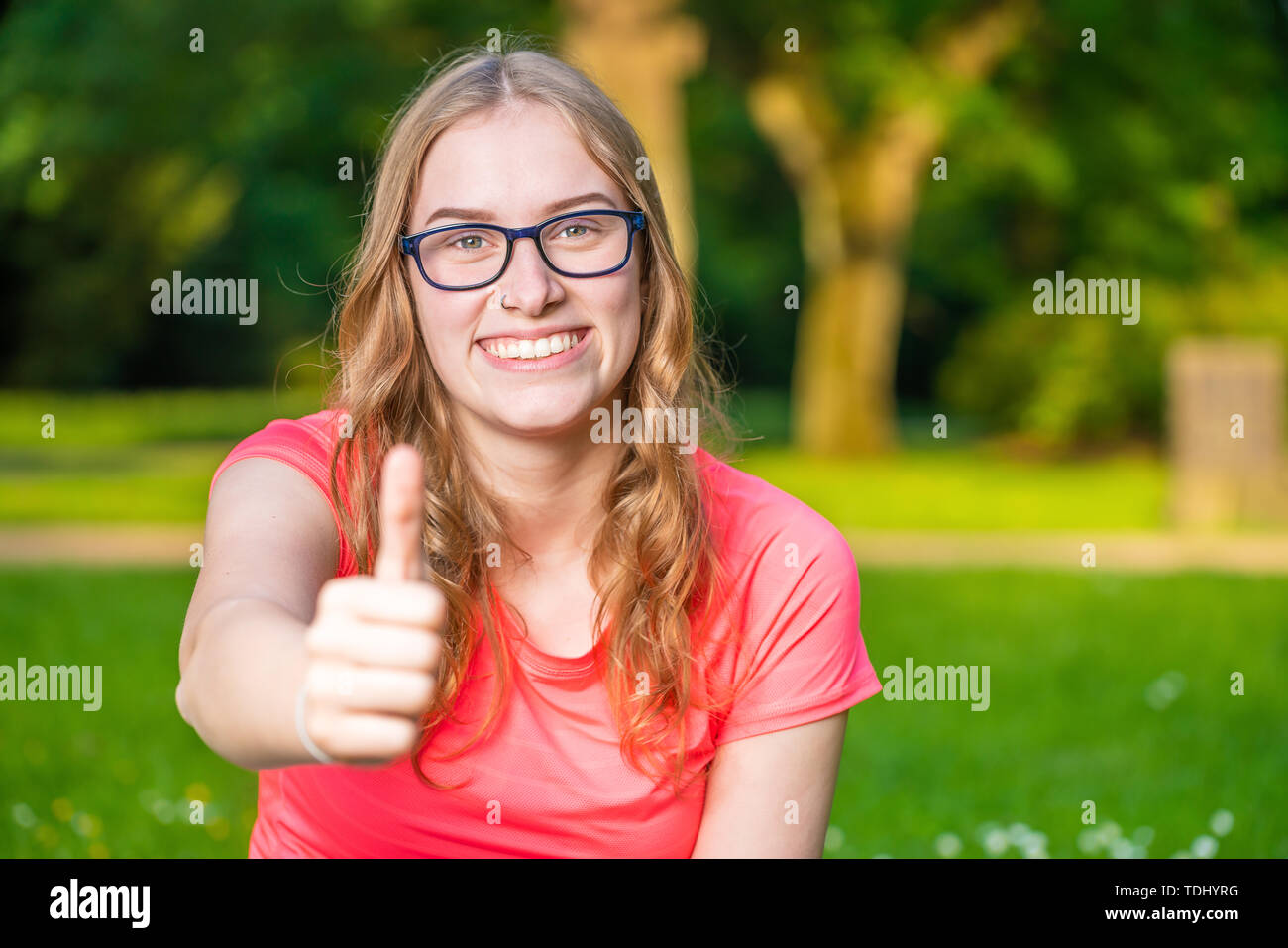 Woman smiles showing face hi-res stock photography and images - Alamy