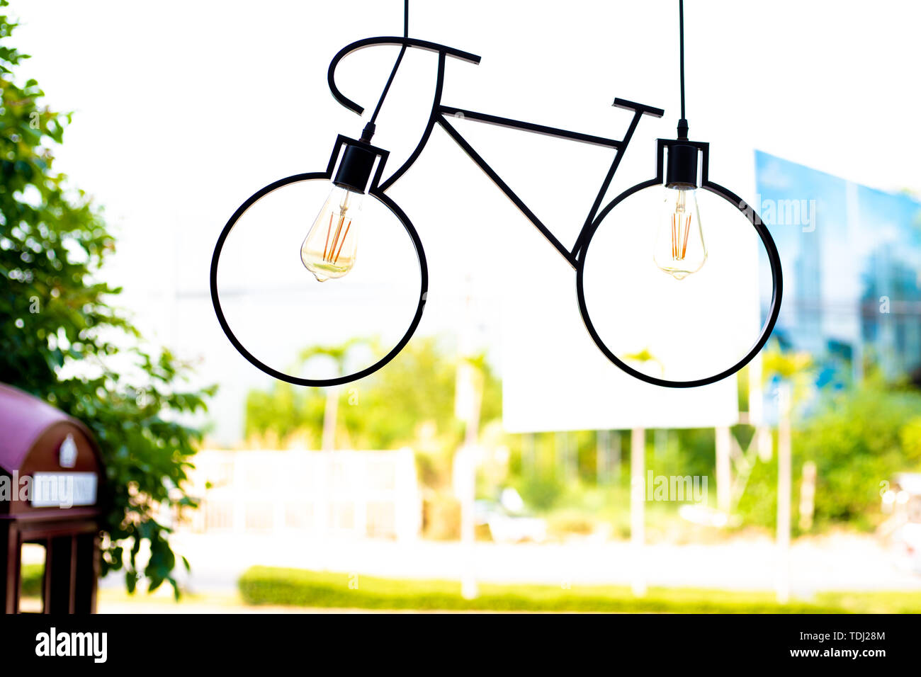 Ceiling lamp. Light fixture made in the shape of a bicycle Stock Photo ...