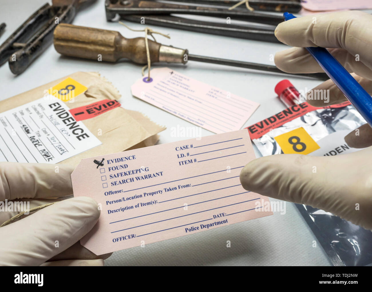 Police expert writes about label evidence number, Various laboratory ...