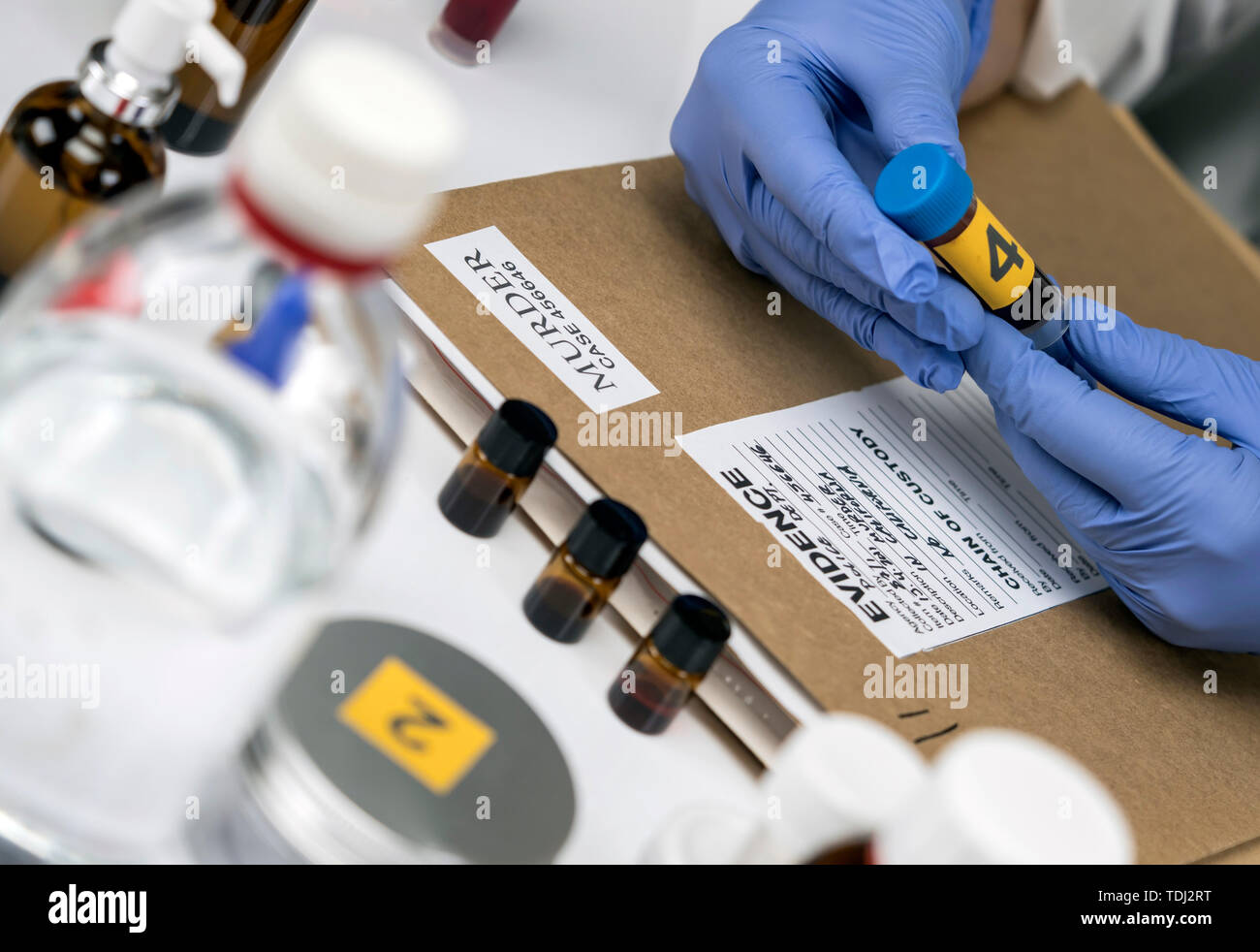 Scientific Police takes blood sample at Laboratory forensic equipment ...