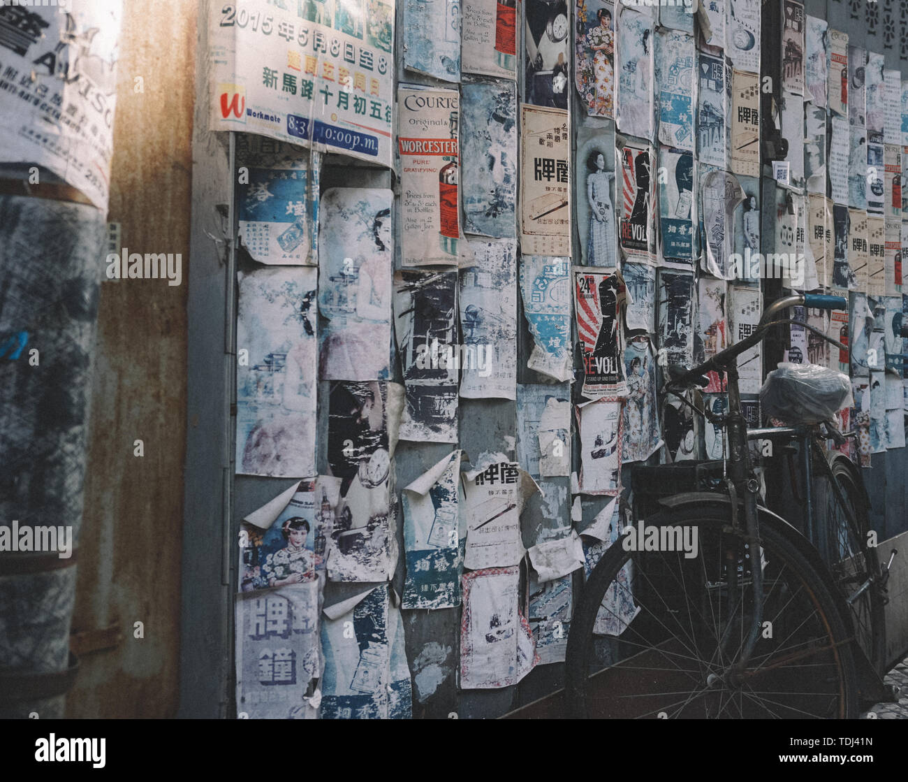 The walls of publicity leaflets on the side of the road in Hong Kong ...