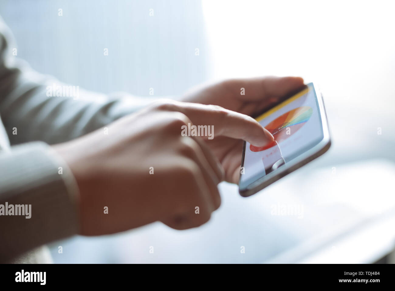 Mobile phone in man's hand Stock Photo - Alamy