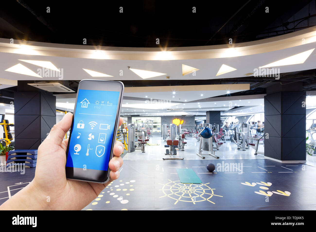 smart phone with smart home with modern gym Stock Photo - Alamy
