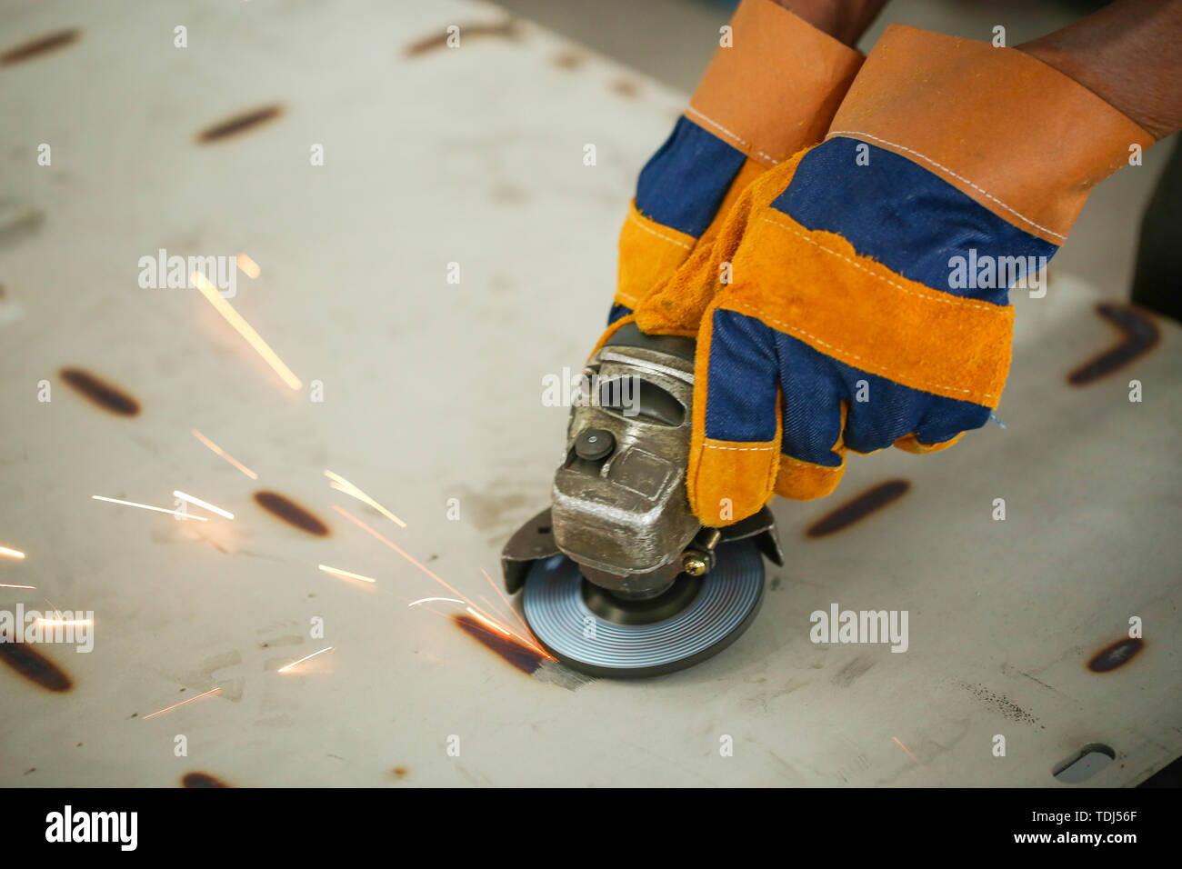 The workers are polishing and polishing Stock Photo - Alamy
