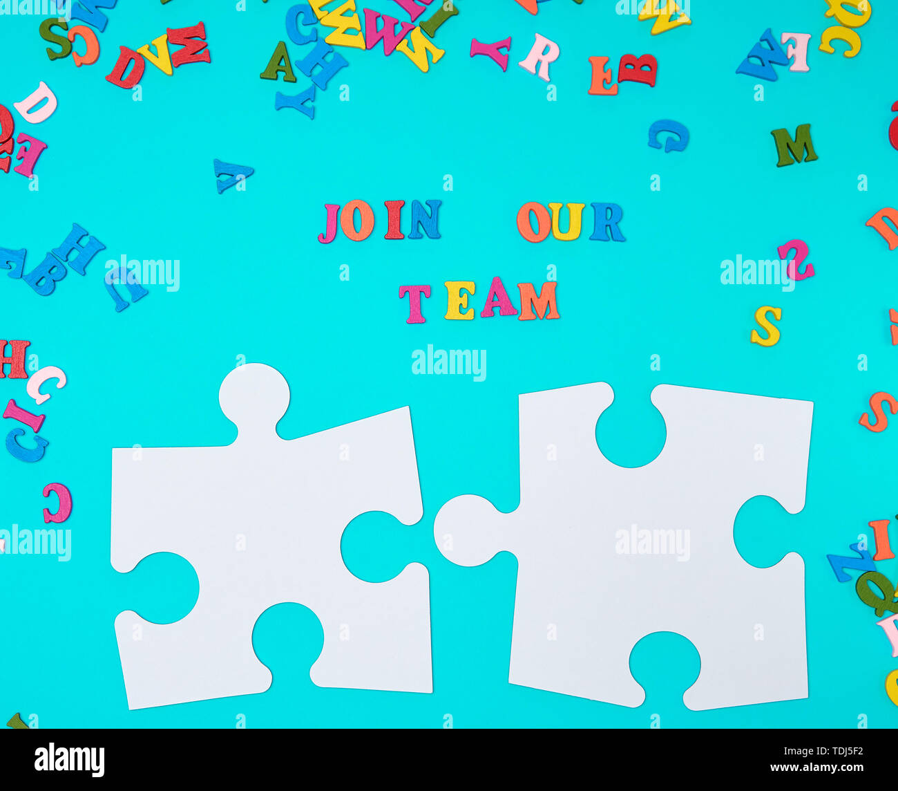 paper blank white puzzle on a blue background, inscription join our ...