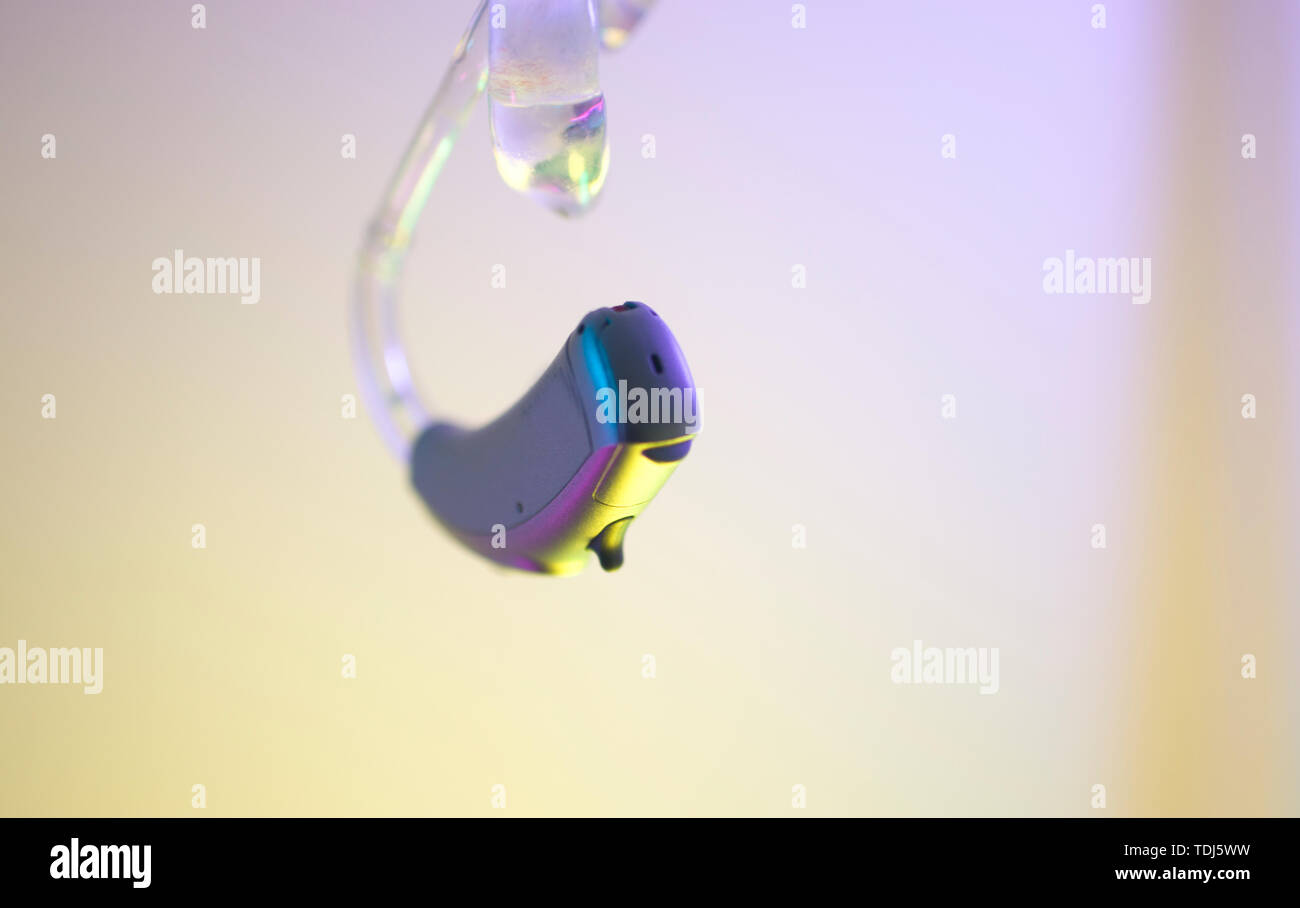 Modern digital hearing aid for deafness and deaf people Stock Photo - Alamy