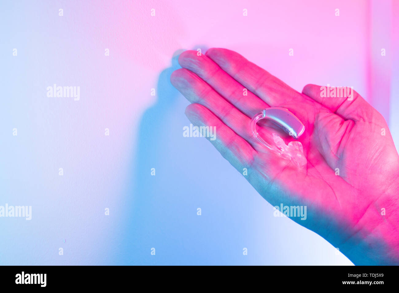 Modern digital hearing aid for deafness and deaf people Stock Photo - Alamy