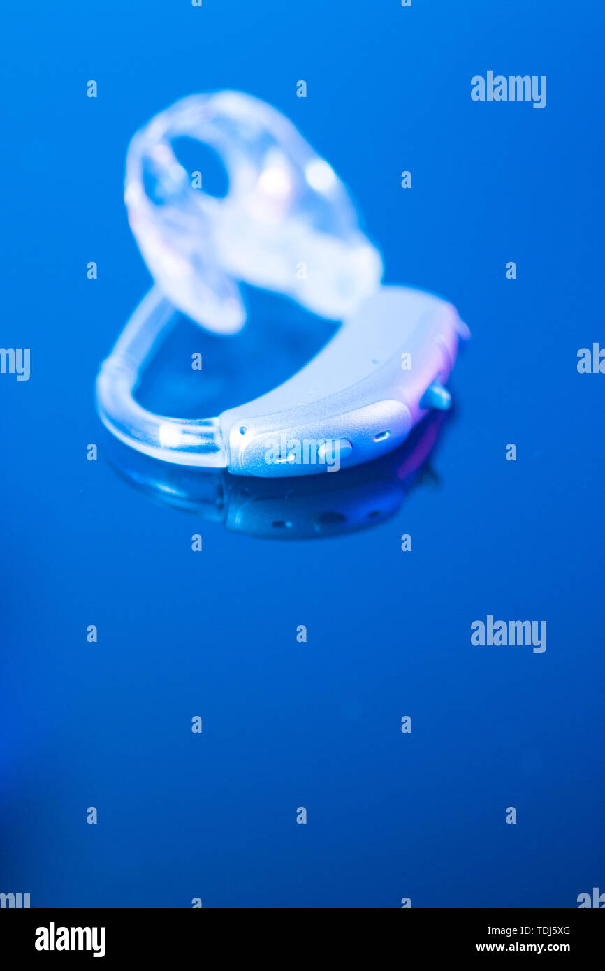 Modern digital hearing aid for deafness and deaf people Stock Photo - Alamy