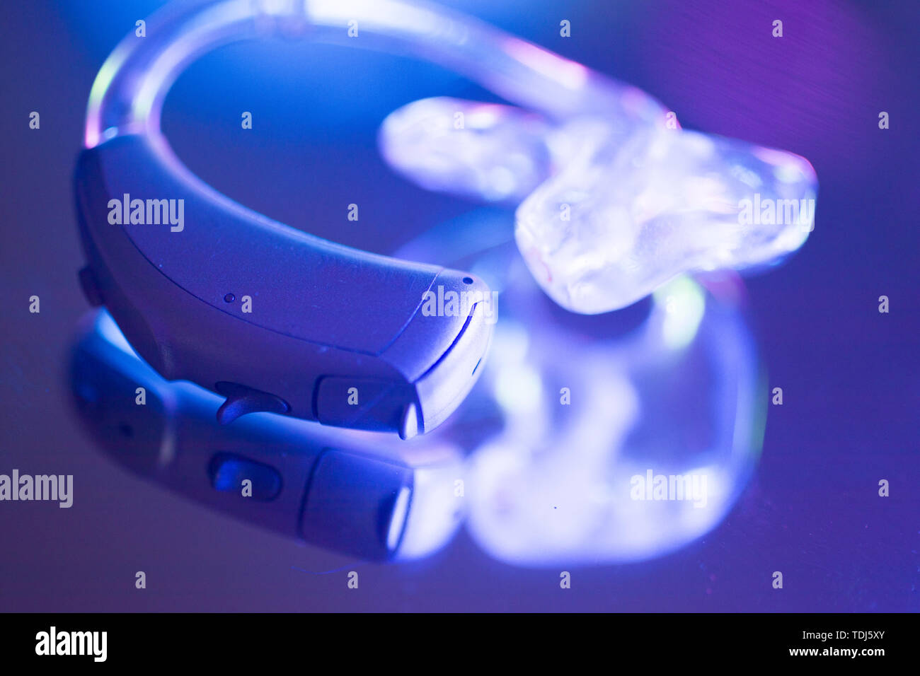 Modern digital hearing aid for deafness and deaf people Stock Photo - Alamy