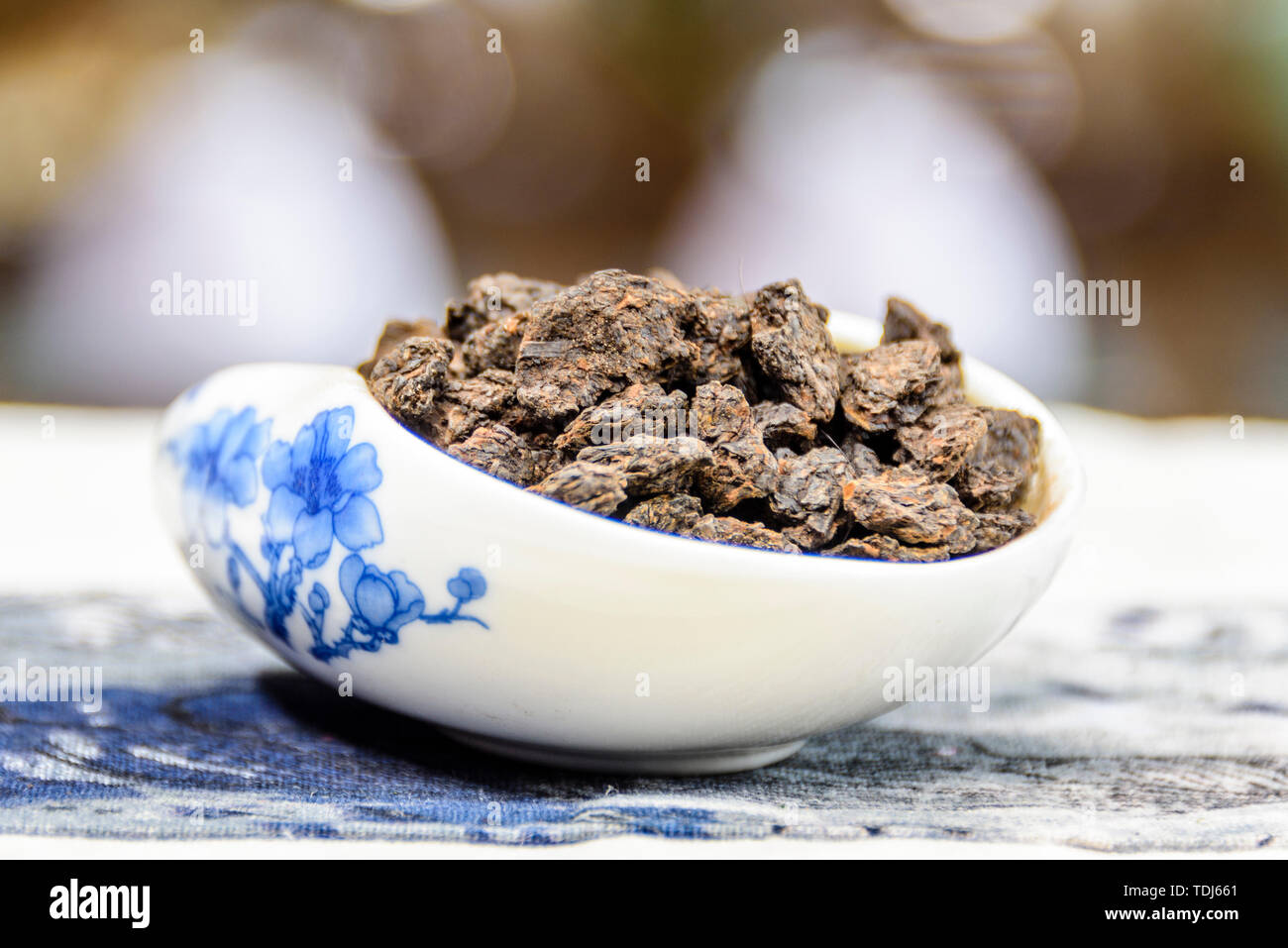 Pu'er old tea head Stock Photo - Alamy