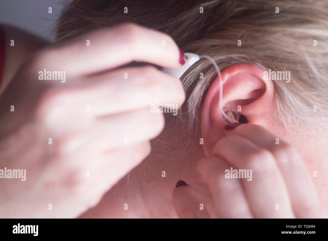 Digital modern technology for deaf people micro hearing aid Stock Photo - Alamy