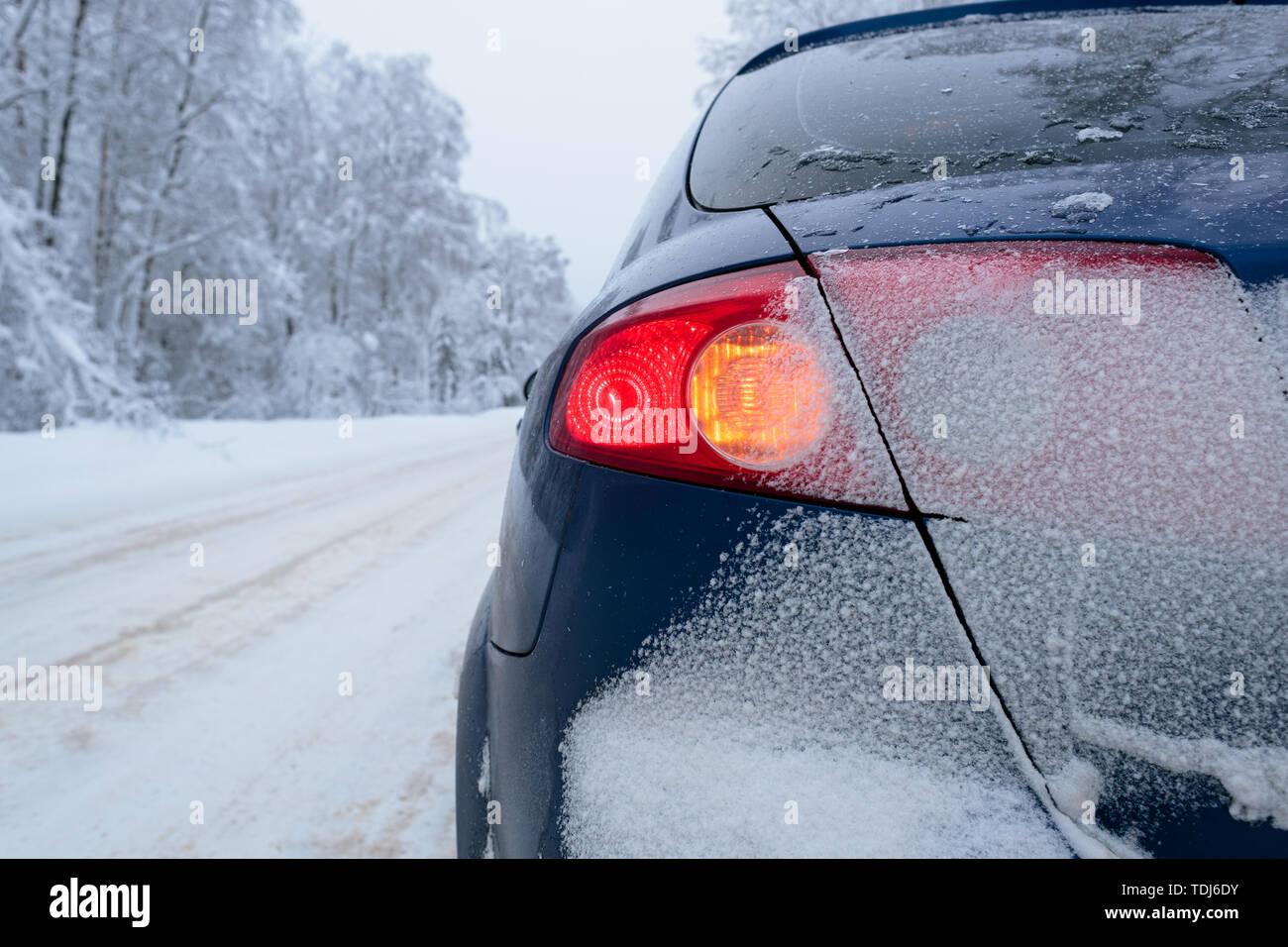 rear headlight of the car in the winter afternoon Stock Photo - Alamy