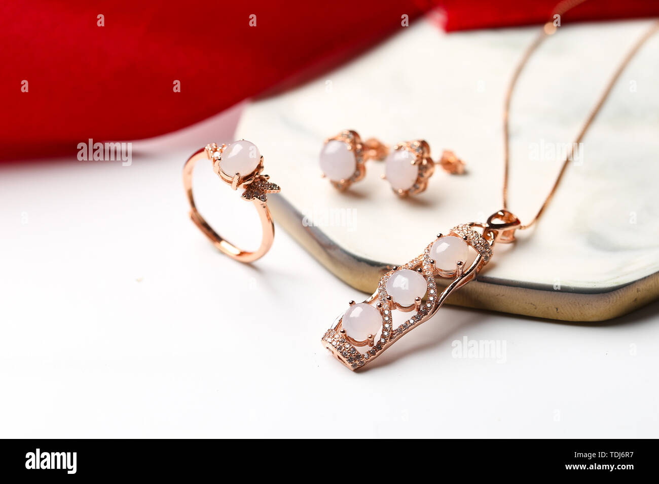 Jade glass species jade earrings hi-res stock photography and images ...