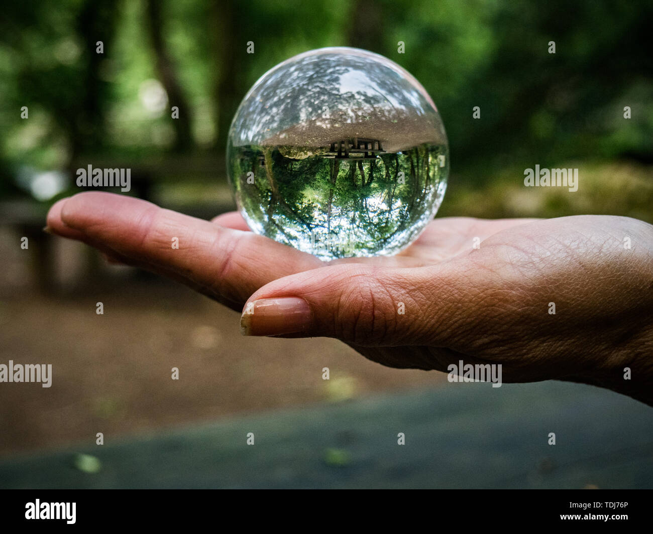 Glass globe hand outdoor hi-res stock photography and images - Alamy
