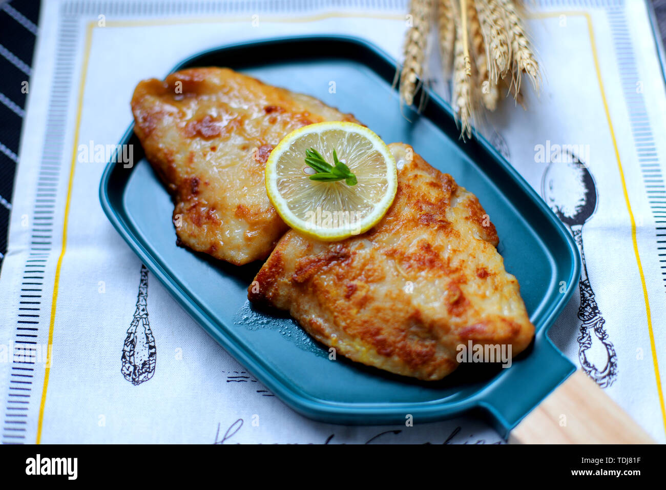Fried dragon fish, fish and fillet Stock Photo - Alamy