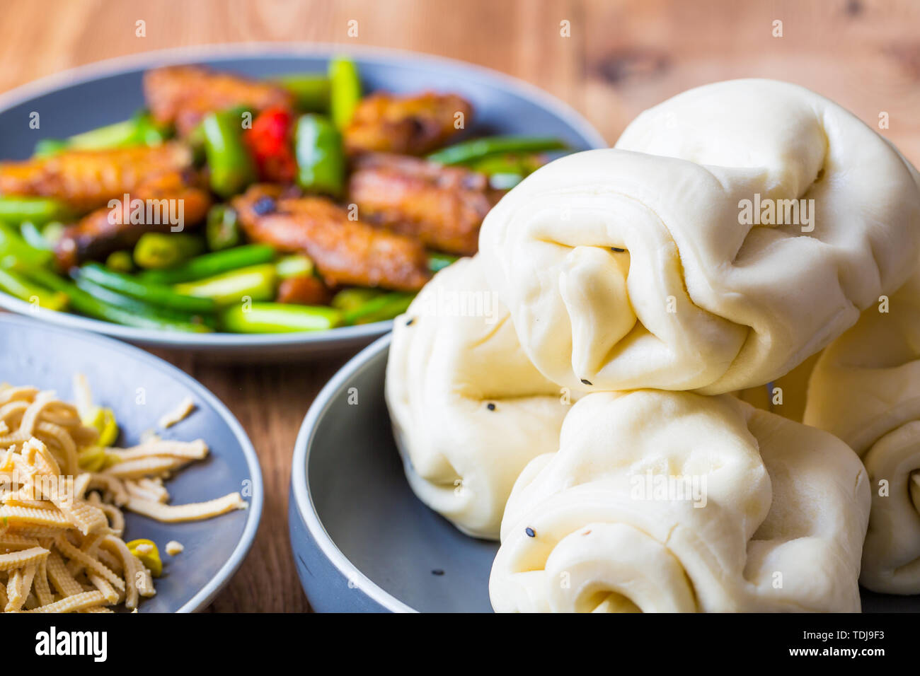 Steamed buns and dishes on the table Stock Photo - Alamy