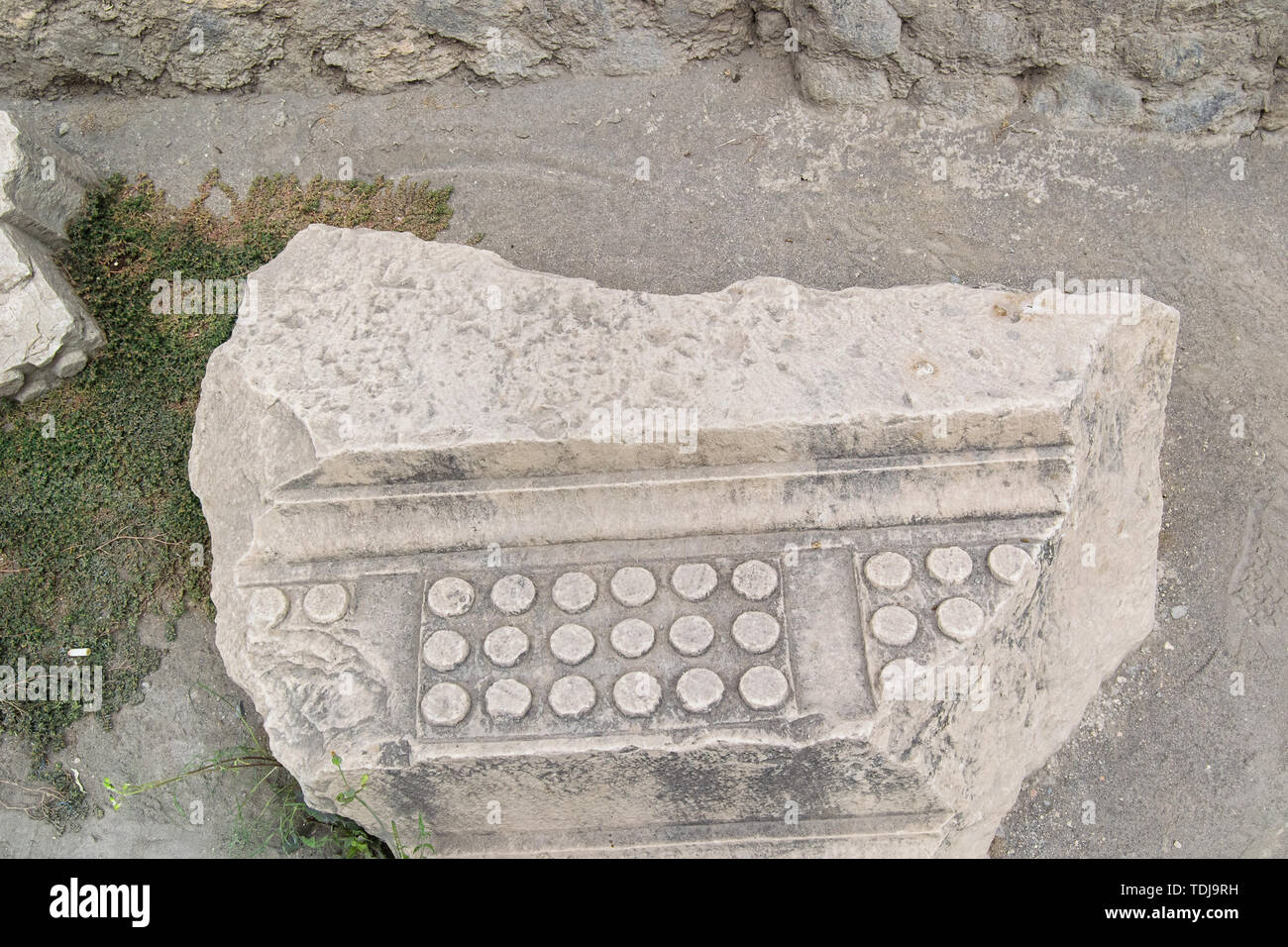 large piece of stone from an old Italian building in the city of Ischia ...