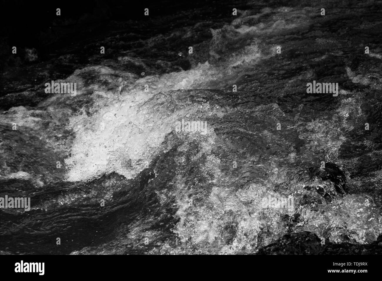 Rapid flow of water Stock Photo - Alamy