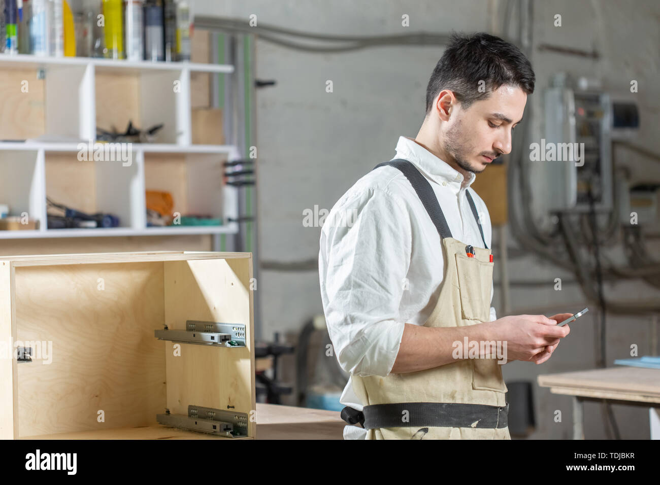 furniture factory, Small-Sized Companies and people concept - Young ...